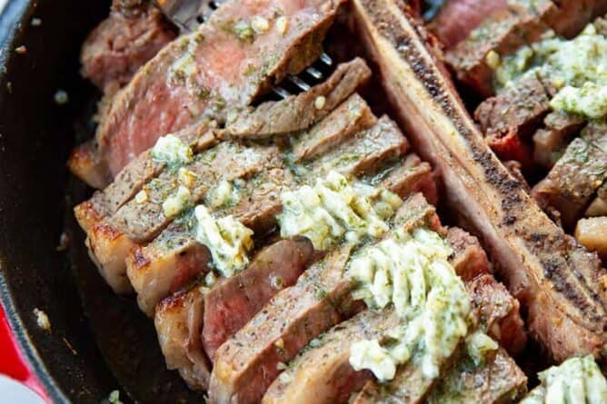 Skillet Porterhouse Steak with Garlic Dill Butter - The Kitchen Magpie