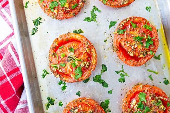 Easy Garlic & Herb Oven Roasted Tomatoes - The Kitchen Magpie